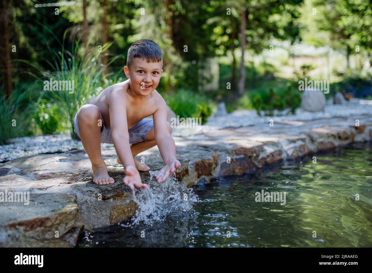 Boy swimming pond hi-res stock photography and images - Alamy