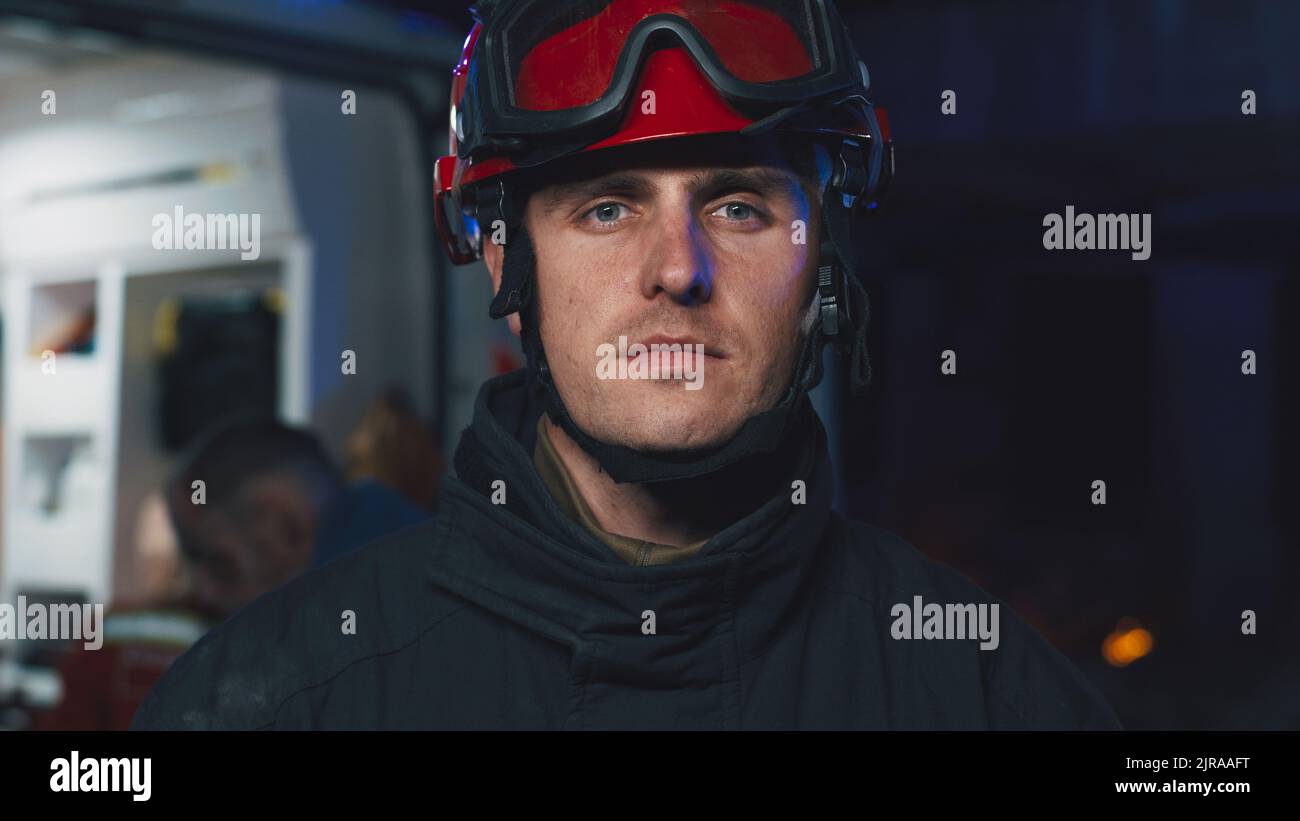 Male rescuer standing near ambulance hi-res stock photography and ...