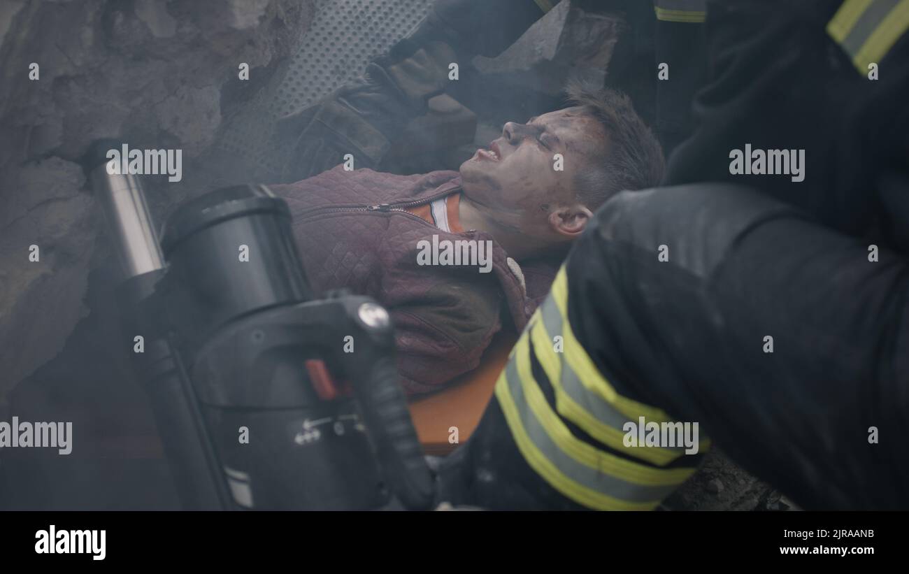 Injured survivor hi-res stock photography and images - Alamy