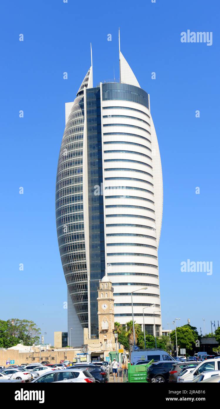 Al-Jarina Mosque with the Sail tower (Beit HaMifras ) building behind ...