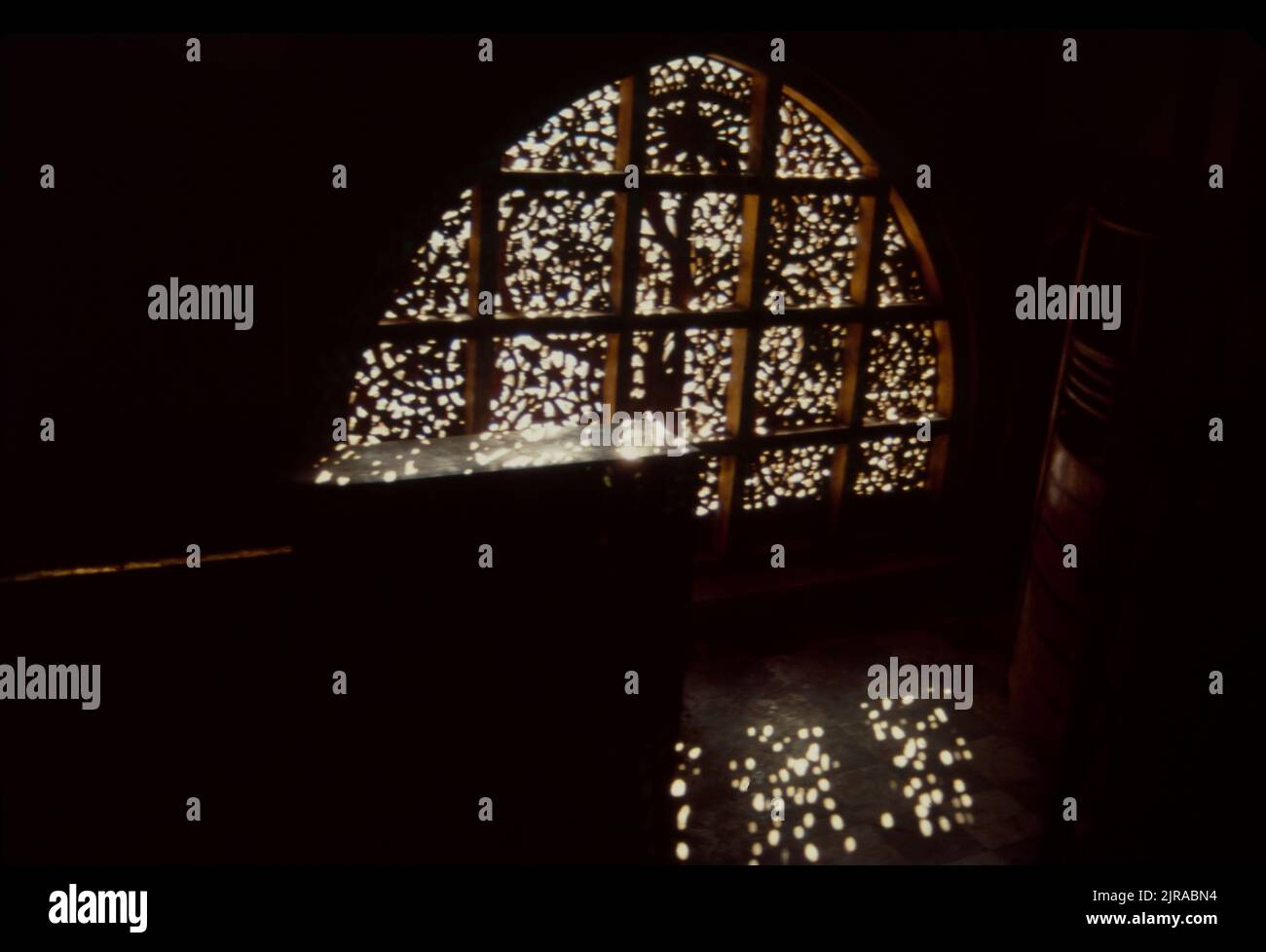 Sunlight through stone grill carving, Gujrat, India Stock Photo - Alamy