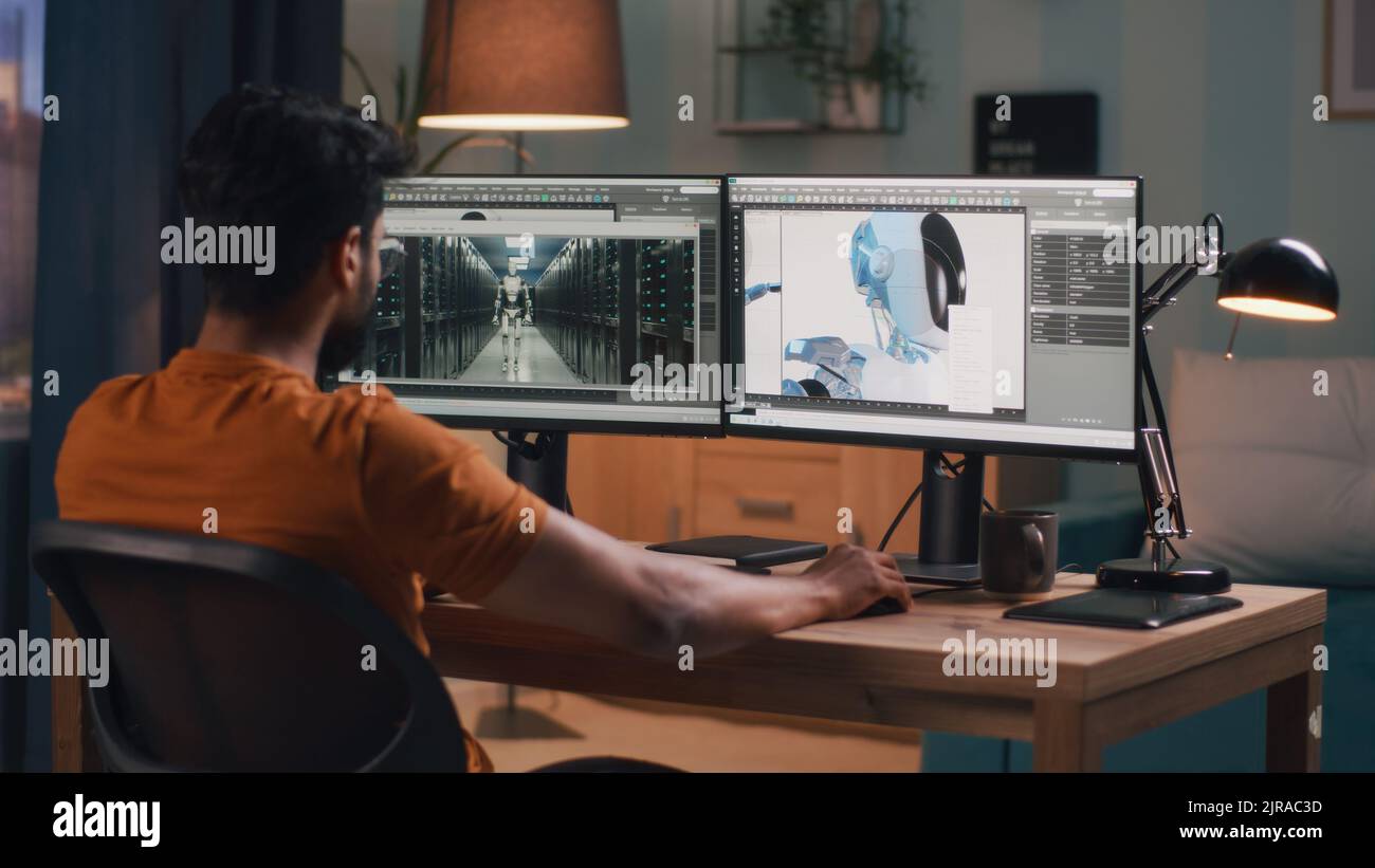 Indian male developer using computer to create and render 3D model of ...