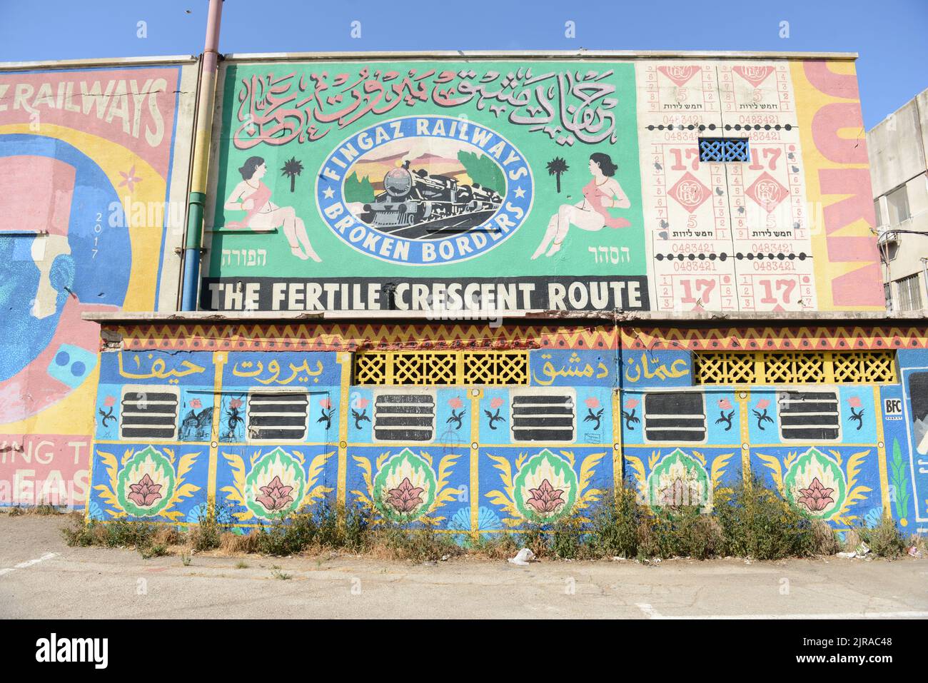 The Broken Fingaz wall murals, depicting an imaginary railway that would reconnect the Middle ...