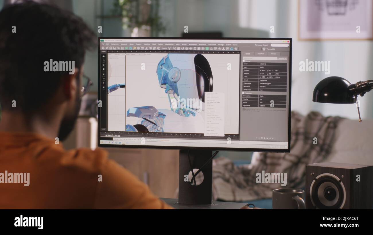 Unrecognizable guy creating and rendering 3D model of futuristic robot ...