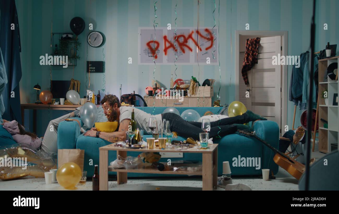 Man waking up on sofa hi-res stock photography and images - Alamy