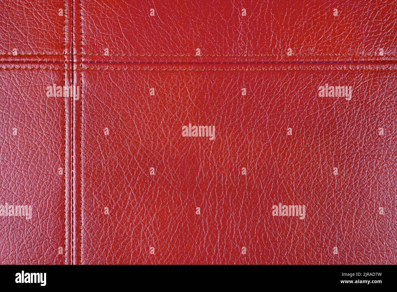 Natural, artificial red leather texture background with decorative seam ...