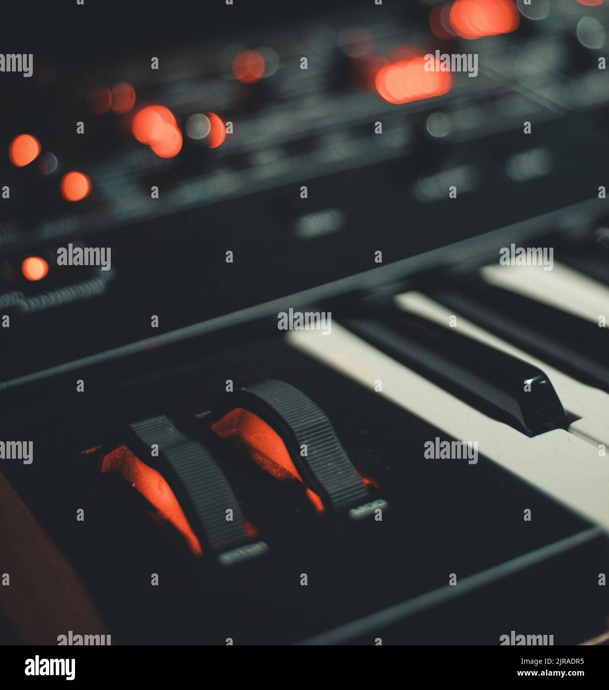 A professional audio mixing console with dim lights Stock Photo - Alamy