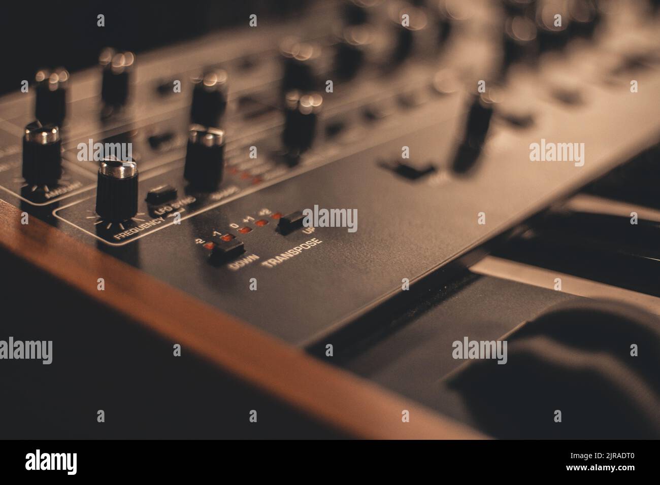 A professional audio mixing console with dim lights Stock Photo - Alamy