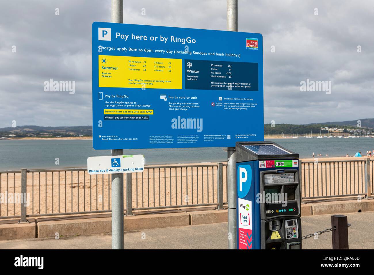 A parking tariff sign on Exmouth seafront Stock Photo - Alamy