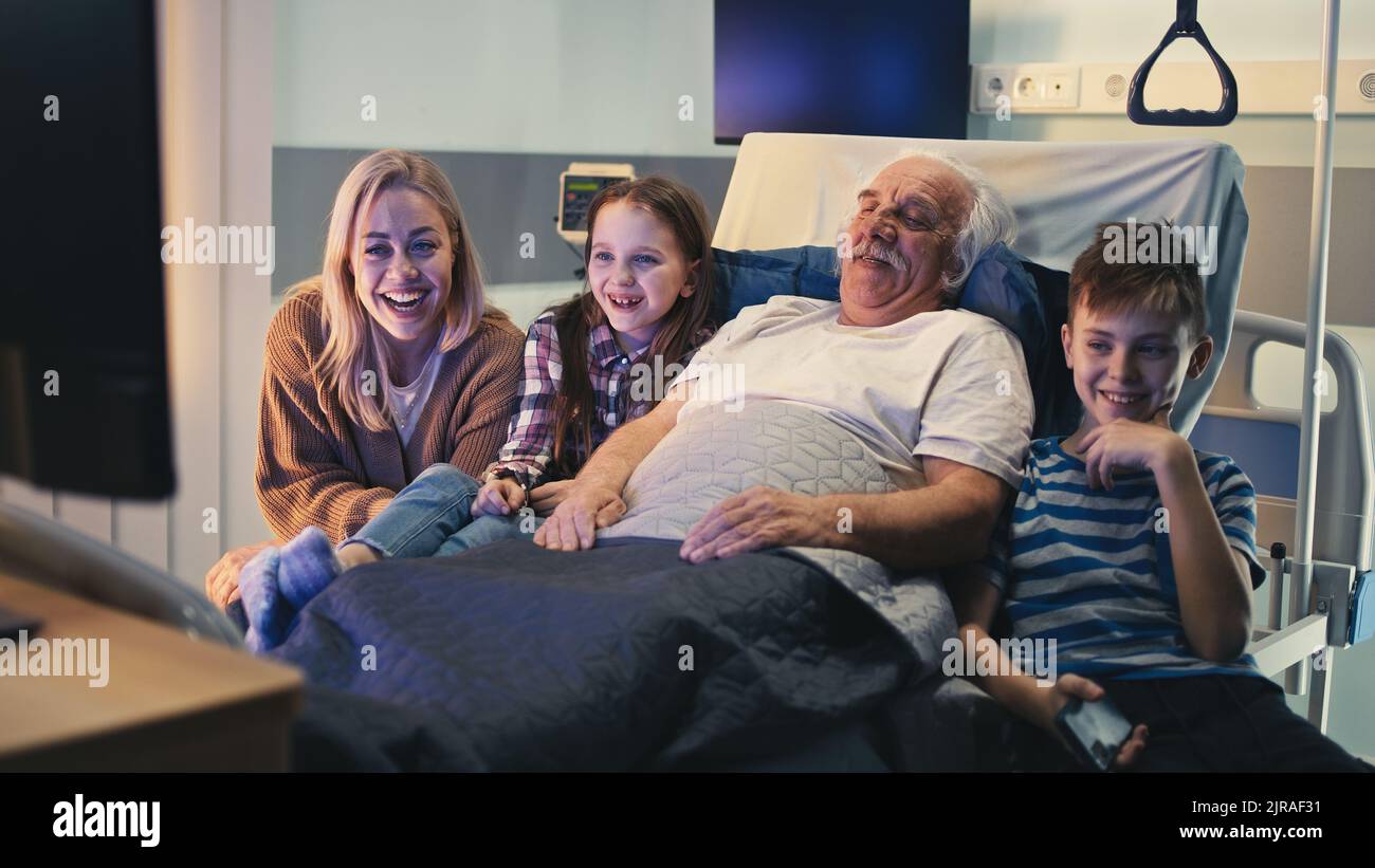 Hospital patient watching tv in bed hi-res stock photography and images ...