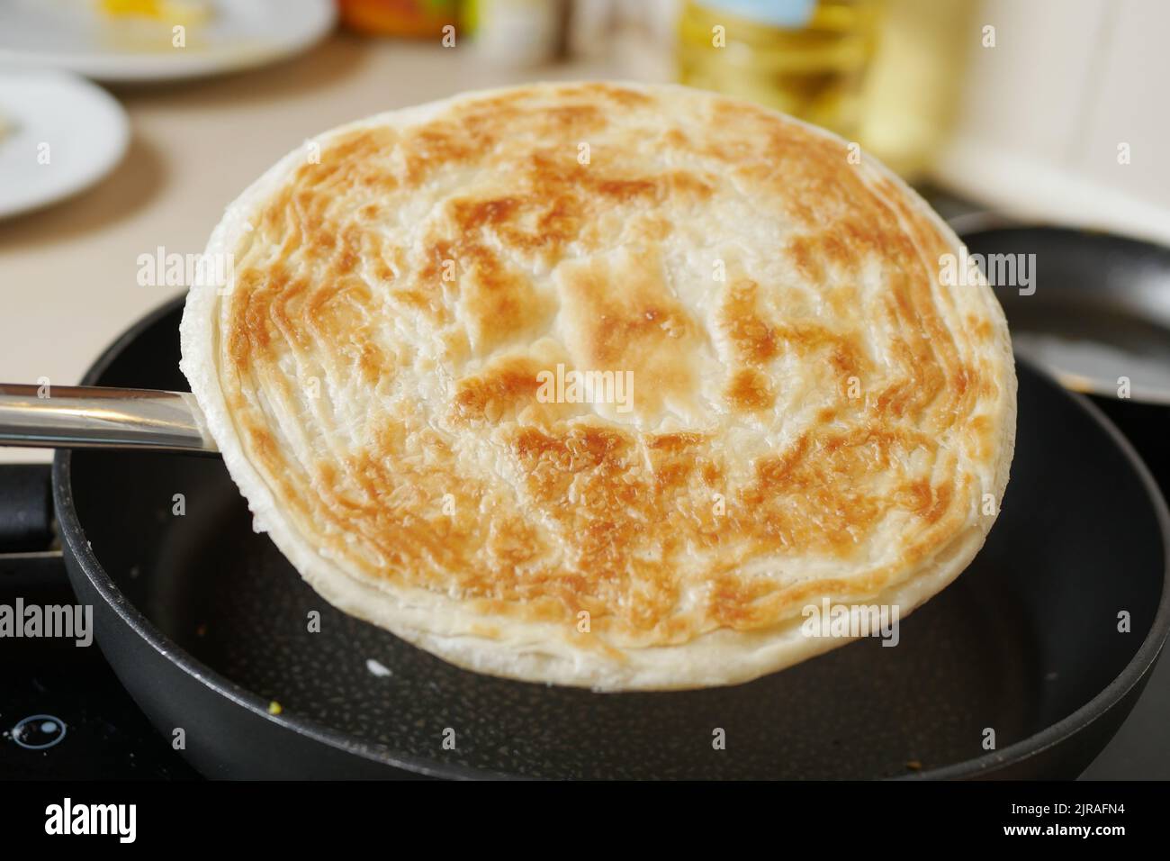 Cooking roti hi-res stock photography and images - Alamy
