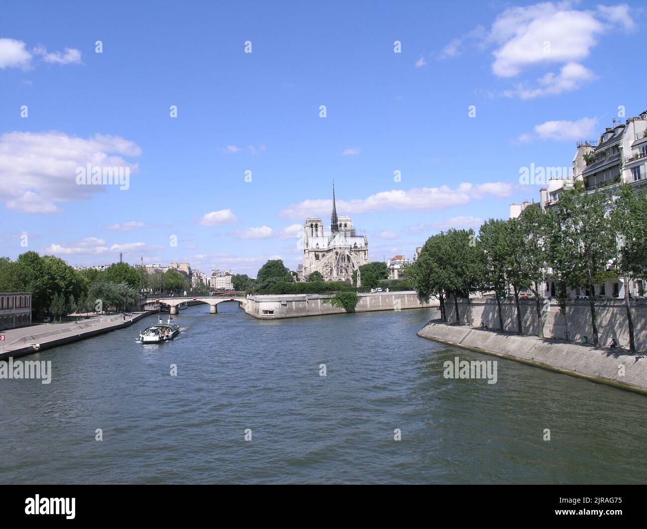 The Cathedral Notre-Dame of Paris on the other side of the Seine River ...