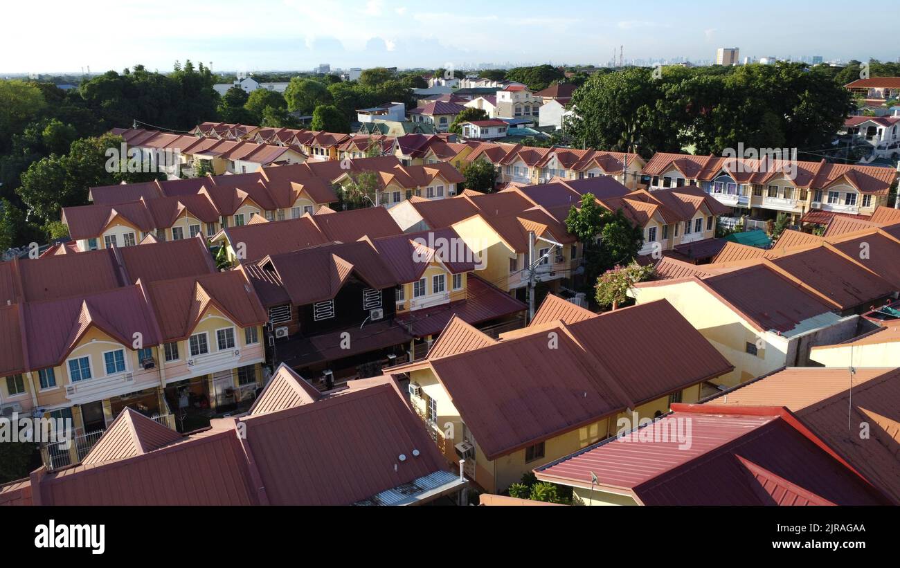 An aerial view of rows of houses in Bacoor City, Cavite, Philippines ...
