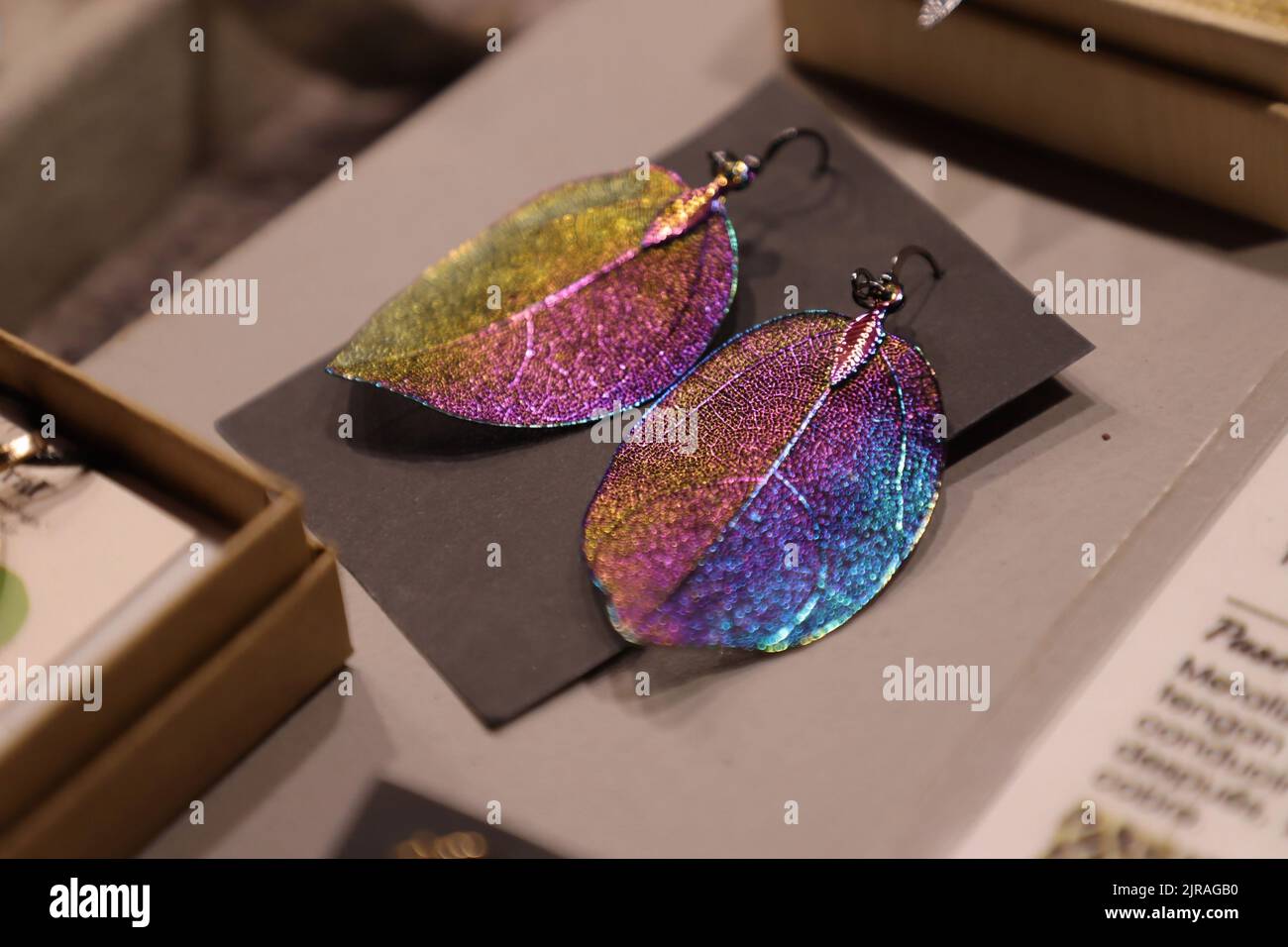 Leaf shaped earrings hi-res stock photography and images - Alamy