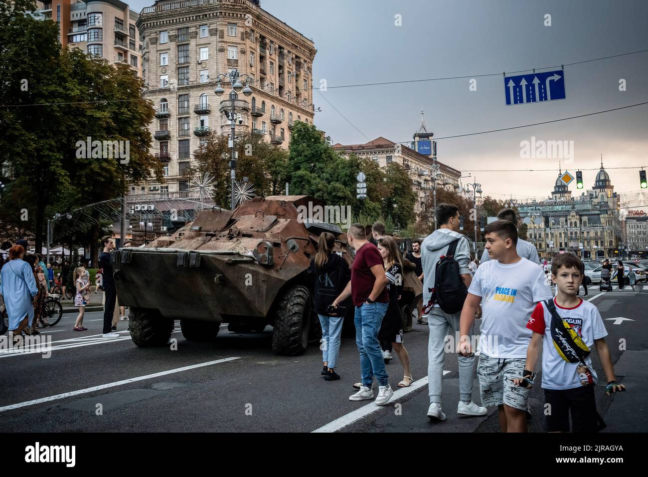 A wreckage of a Russian anti-personnel carrier (APC) can be seen in ...