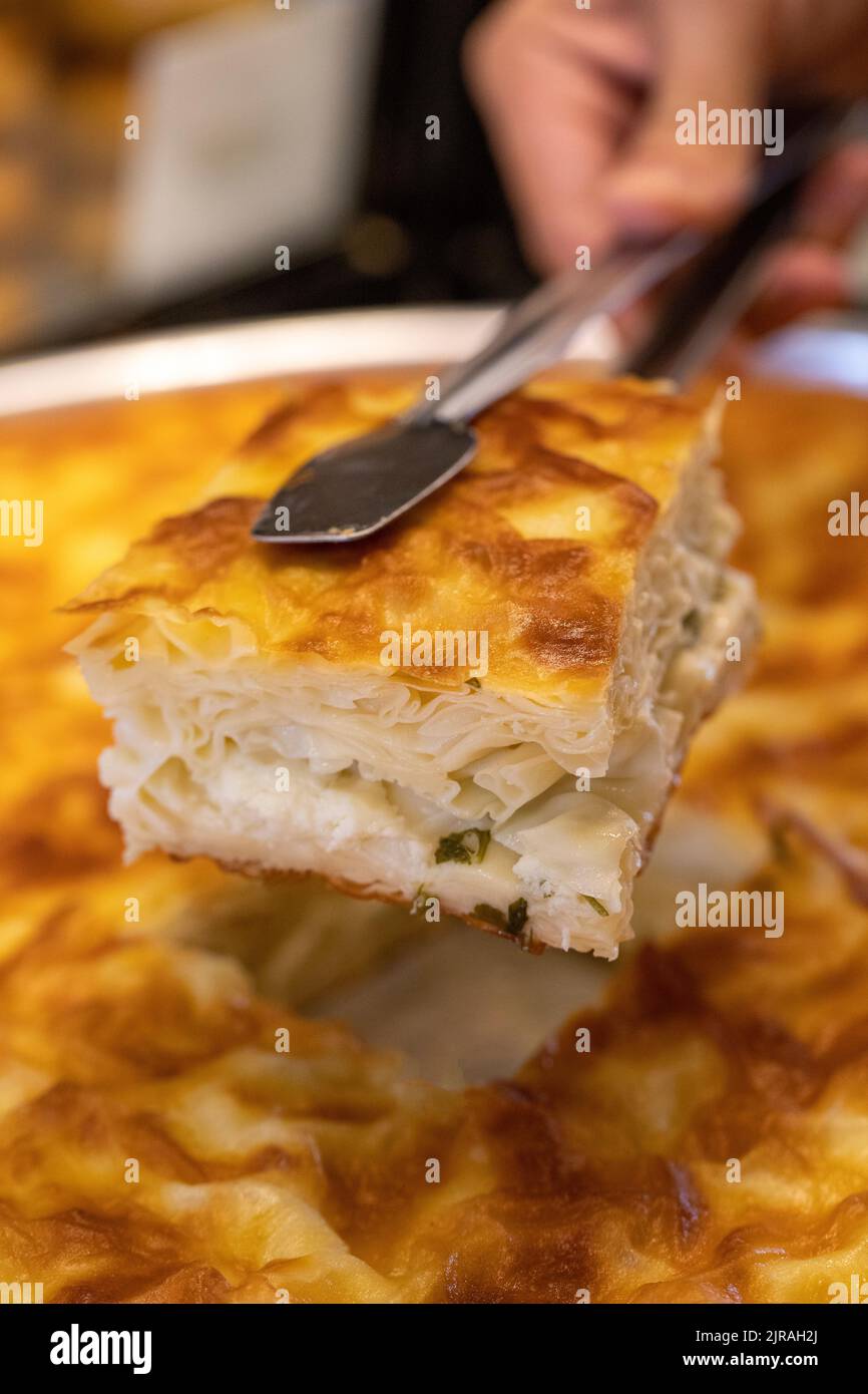 Cheesy pastry. Freshly baked cheese pie. Close-up. local name peynirli ...