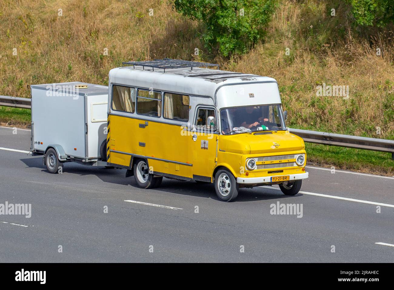 1980s 80s eighties yellow Opel Blitz camper van German light middle ...