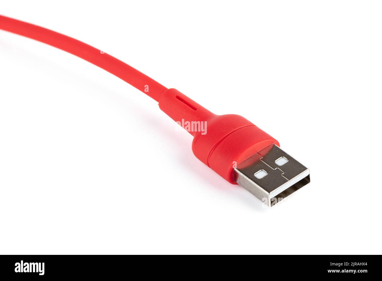 Close-up of a red USB cable on a white background. Copy space Stock ...