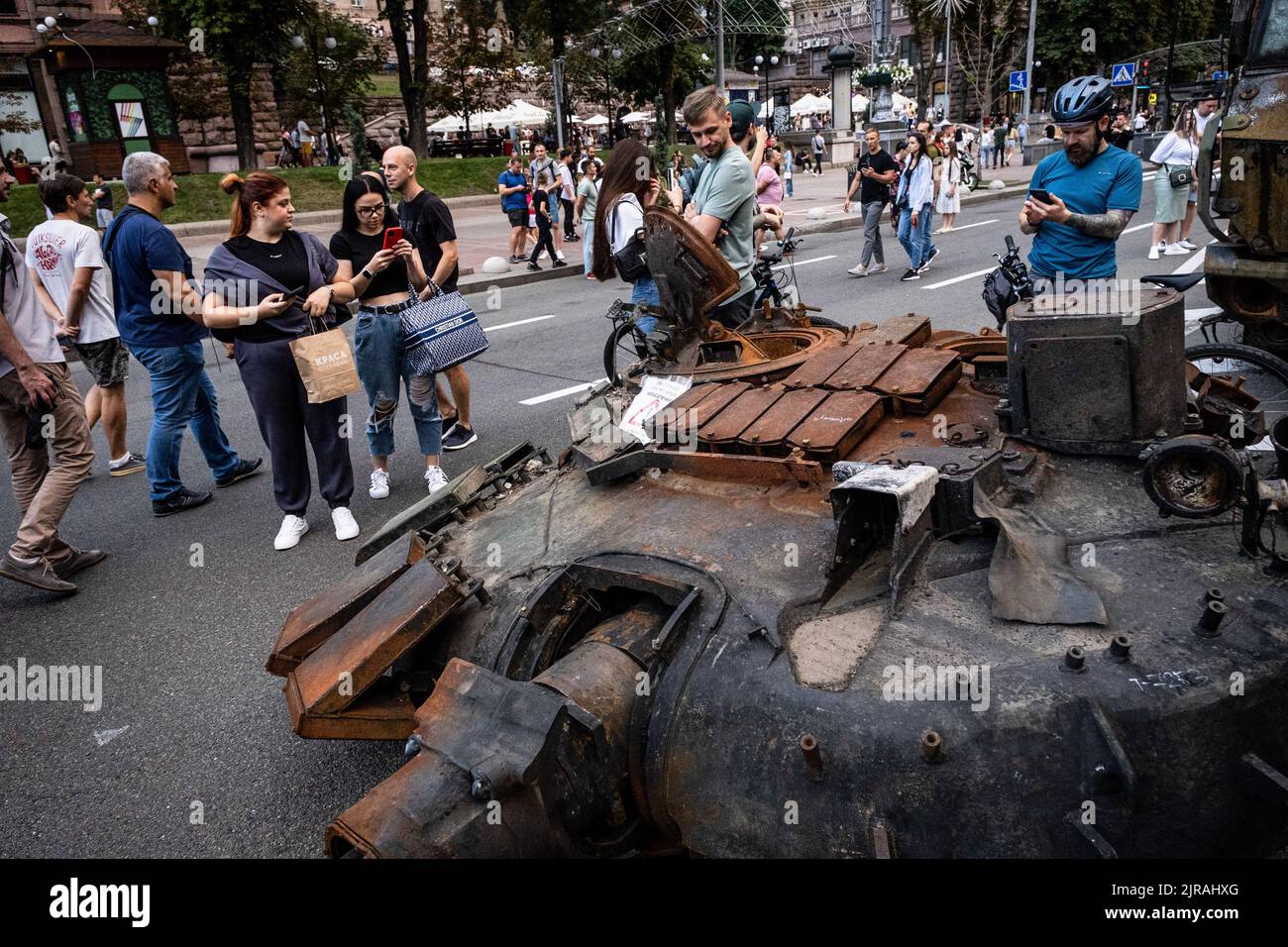 Citizens seen taking pictures of a destroyed Russian tank turret in ...