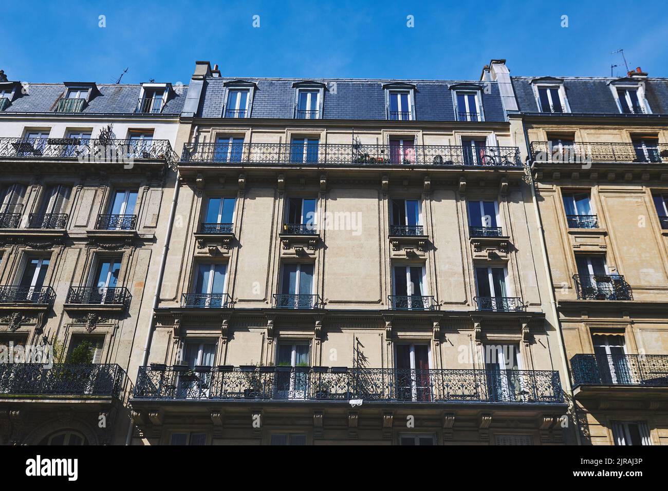 windows of an ancient building in Paris Stock Photo - Alamy