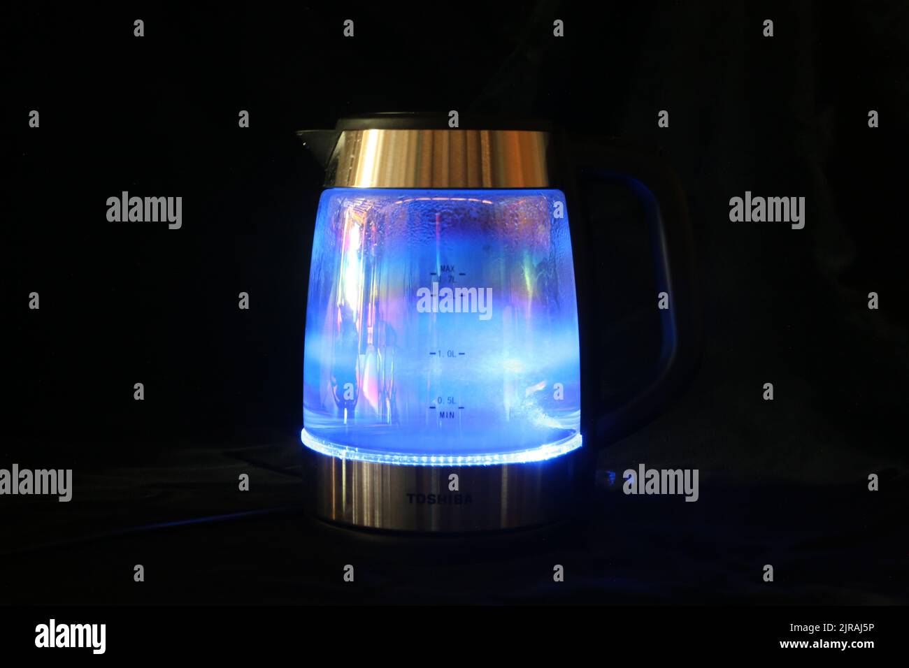 An Electic Kettle on kitchen work surface with wather being boiledThe ...