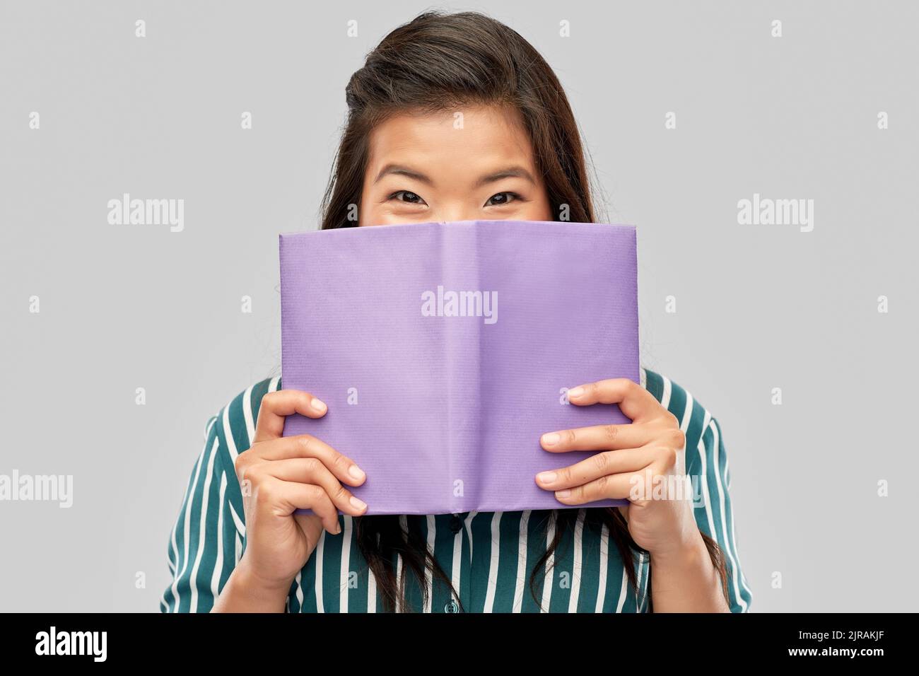 happy asian woman hiding behind Stock Photo - Alamy