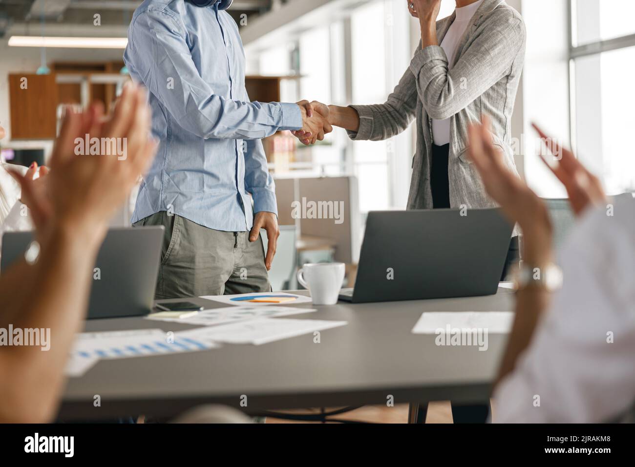 Close up of boss leader shaking hand of new team member recruiting him ...