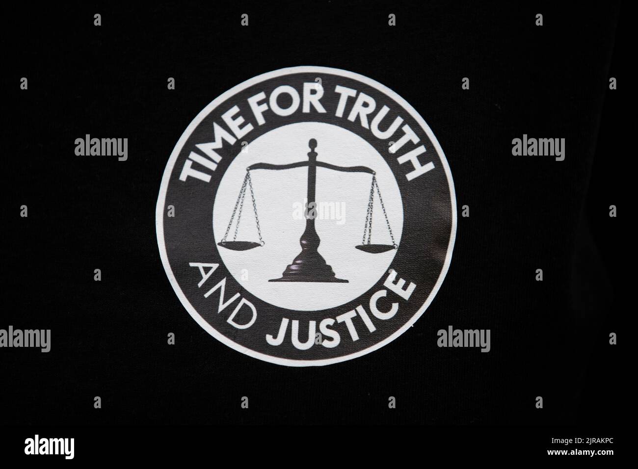 Time For Truth And Justice logo, wore by Mary Sloan of the New lodge 6 ...