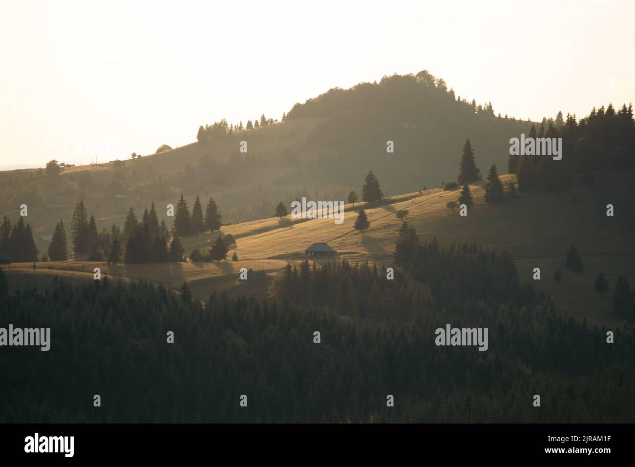 Magic summer sunset over the mountain village at Tihuta, Piatra ...