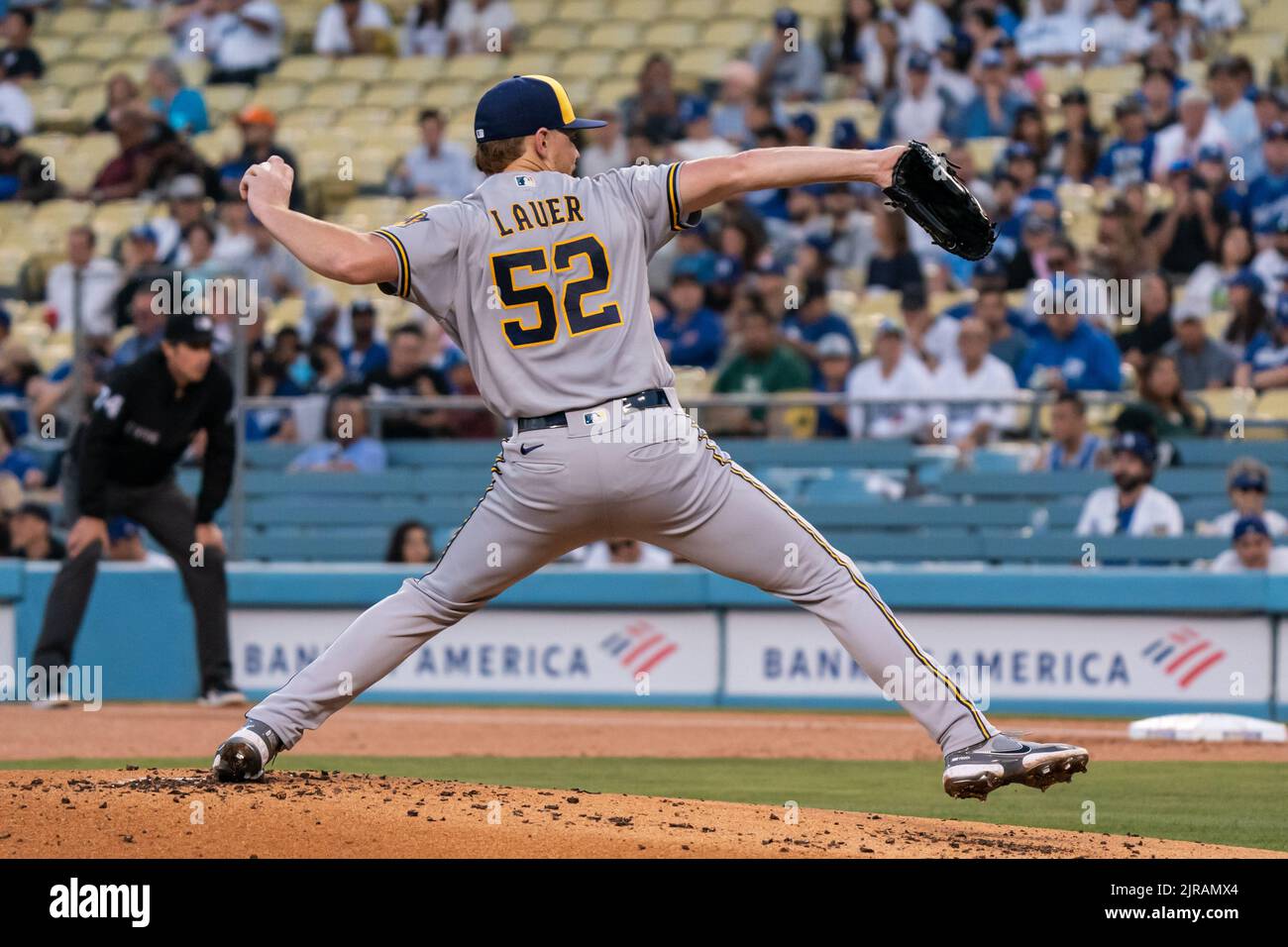 Milwaukee Brewers starting pitcher Eric Lauer (52) throws during a MLB ...