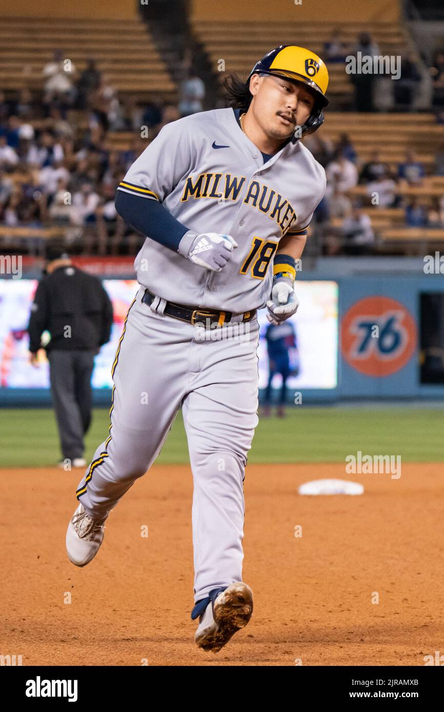 Milwaukee Brewers first baseman Keston Hiura (18) jogs to third base ...