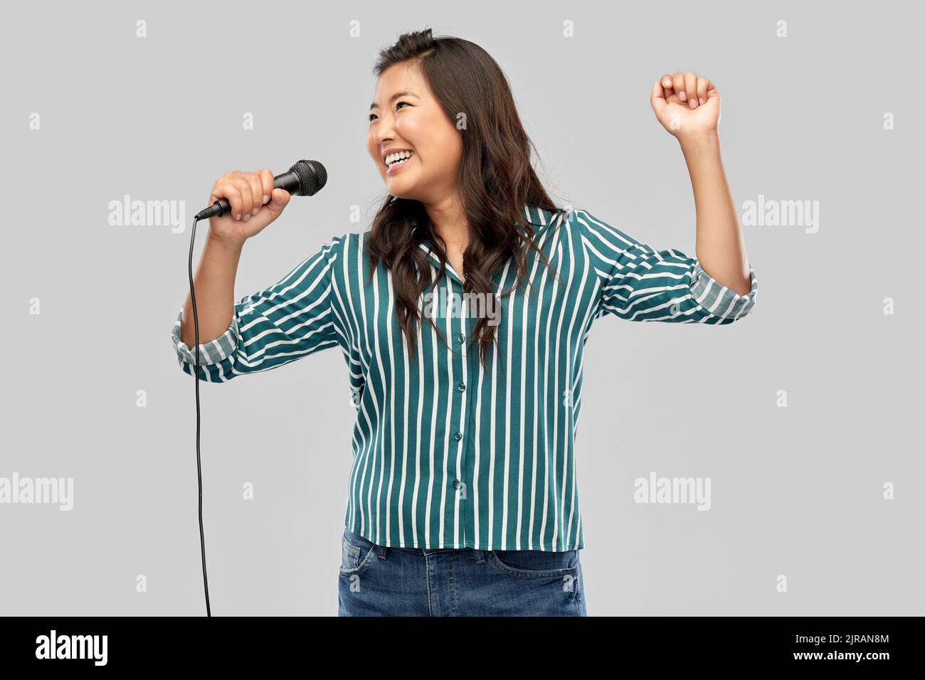 Young beautiful woman singing singer hi-res stock photography and ...