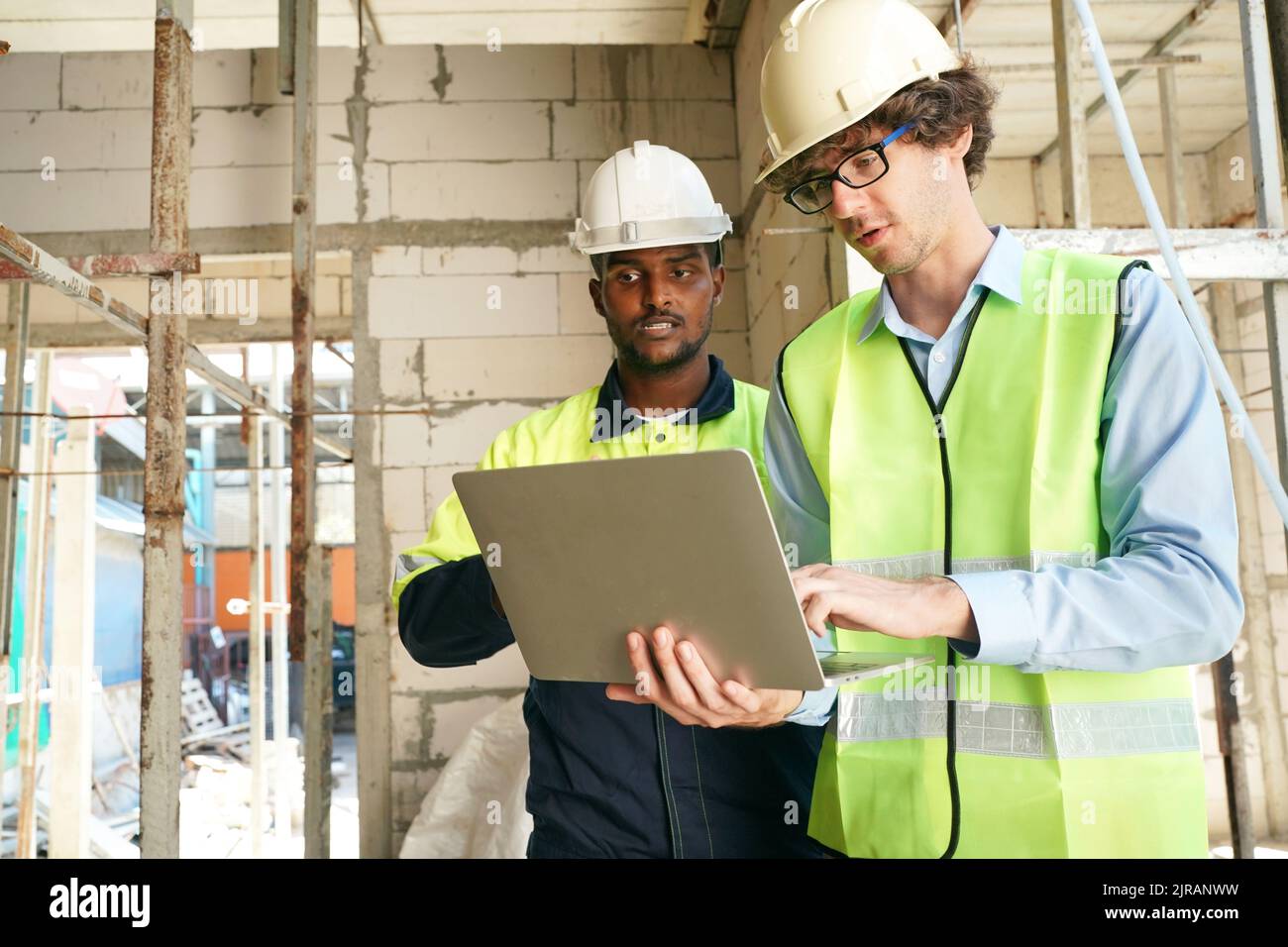 Residential Building. Construction Industry. Caucasian Contractor in ...