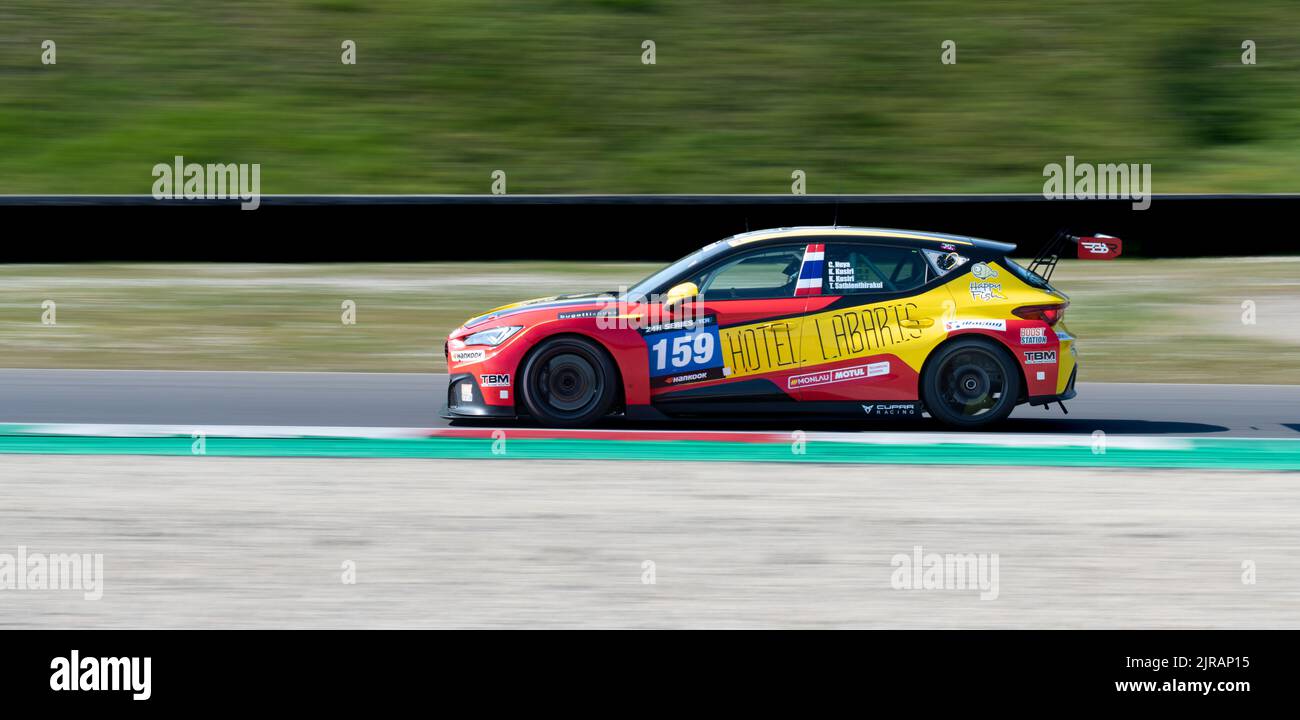 Cupra Leon gt race car, action on racetrack blurred motion background ...