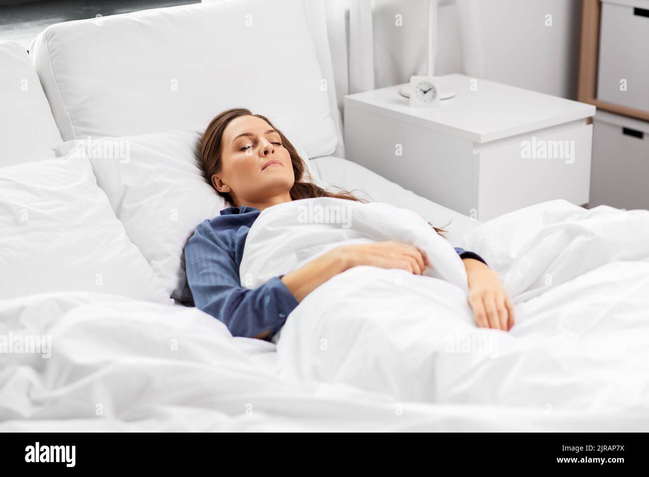 Woman sleeping home hi-res stock photography and images - Alamy