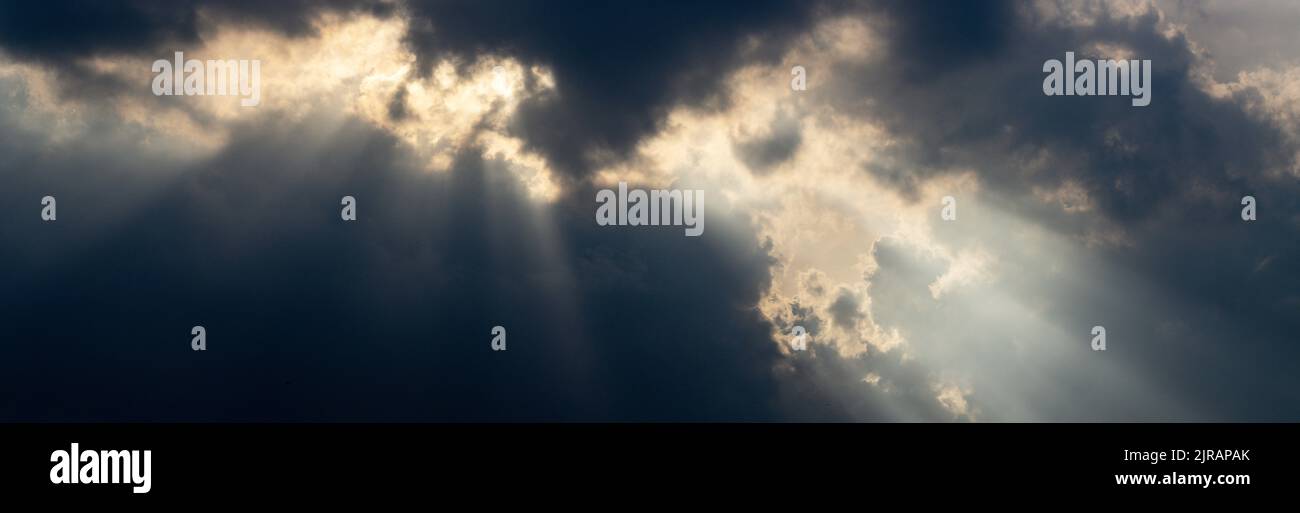 the dark clouds with sunny of sunset before raining Stock Photo - Alamy
