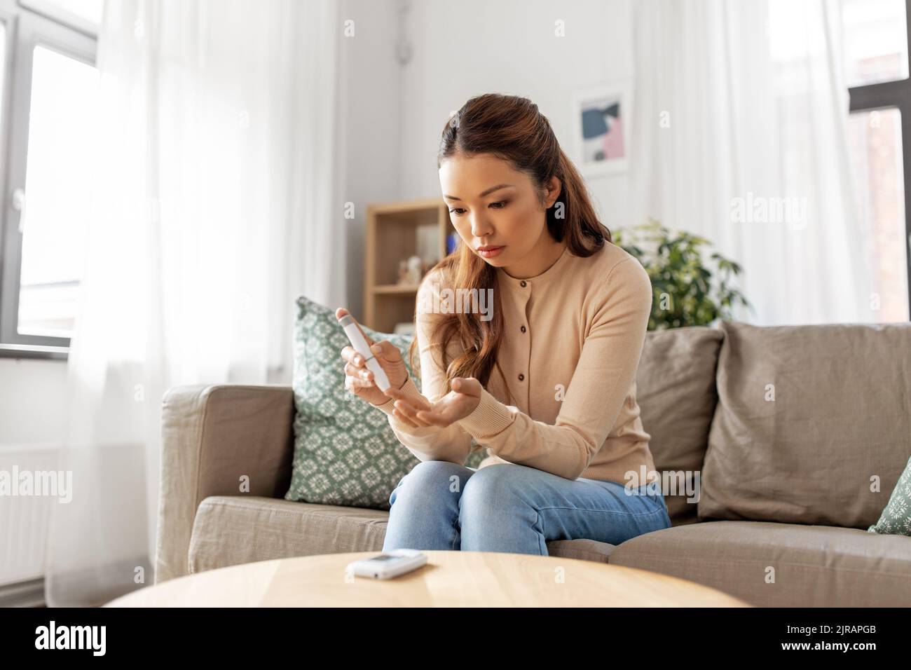 At home glucometer hi-res stock photography and images - Alamy