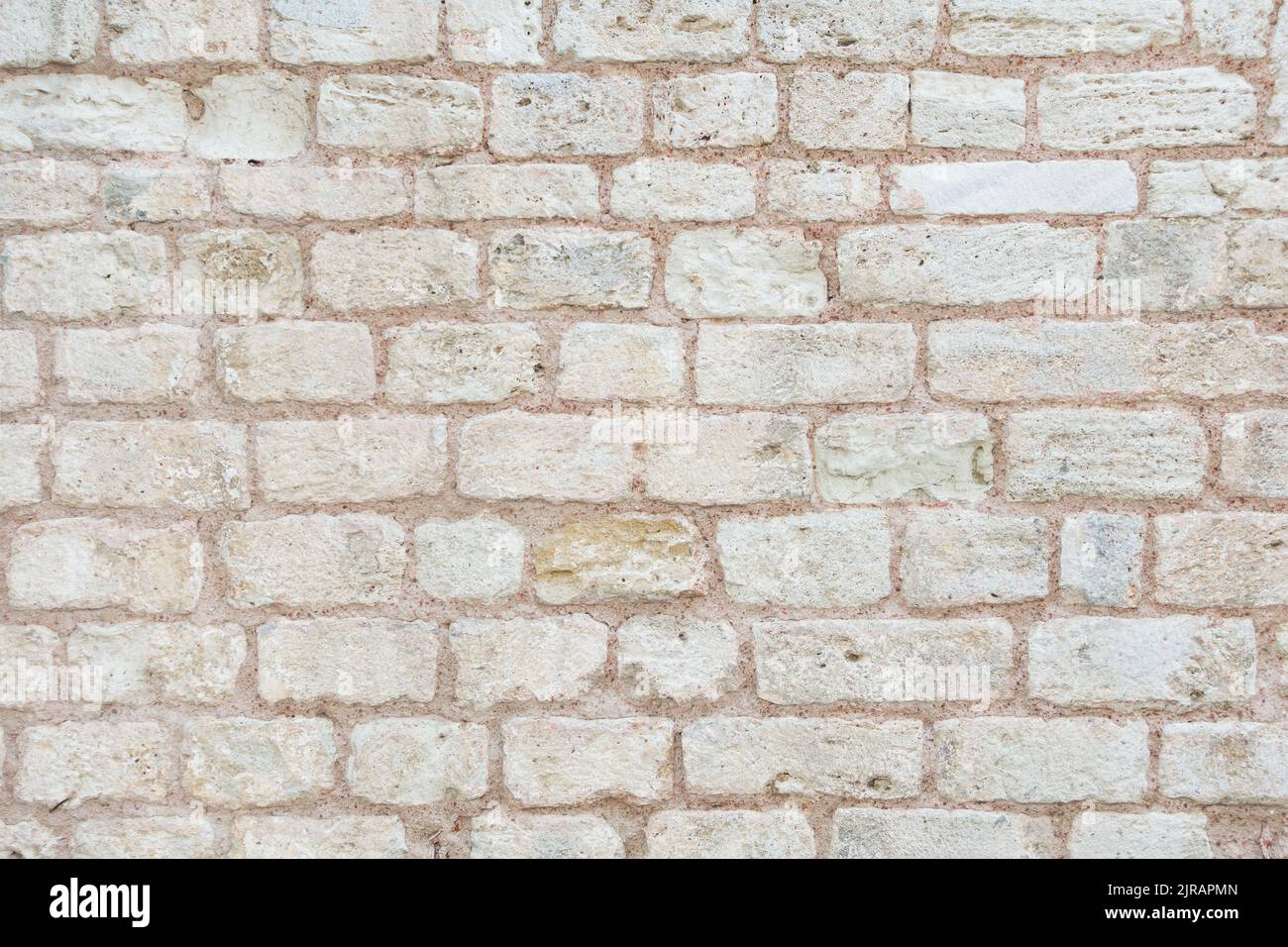 Photo of old brick wall. Beige background, texture of big brick wall ...