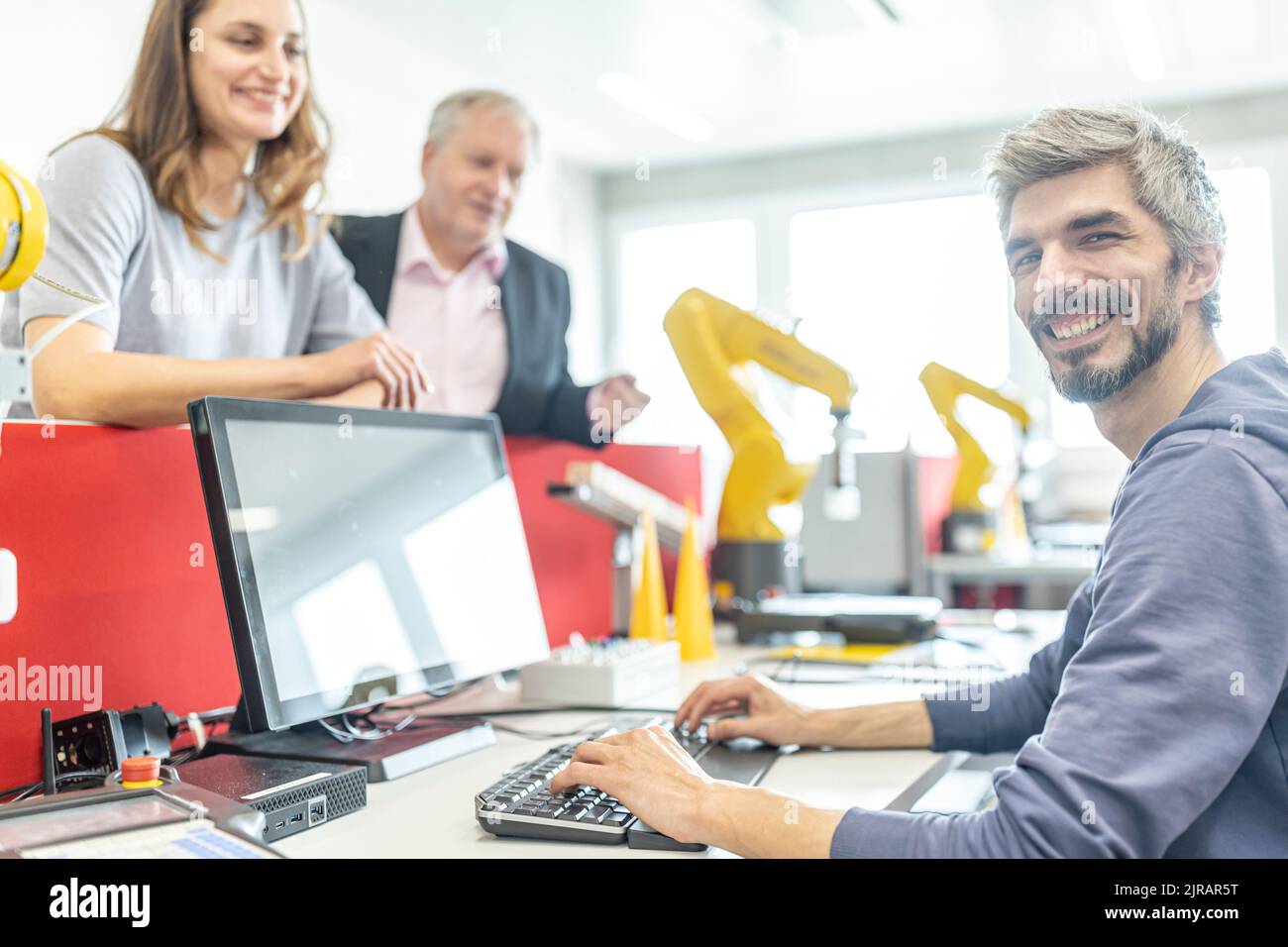 Happy mature colleagues man women hi-res stock photography and images ...