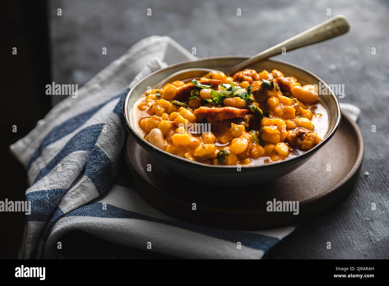 Studio shot of bowl of traditional locro stew Stock Photo - Alamy