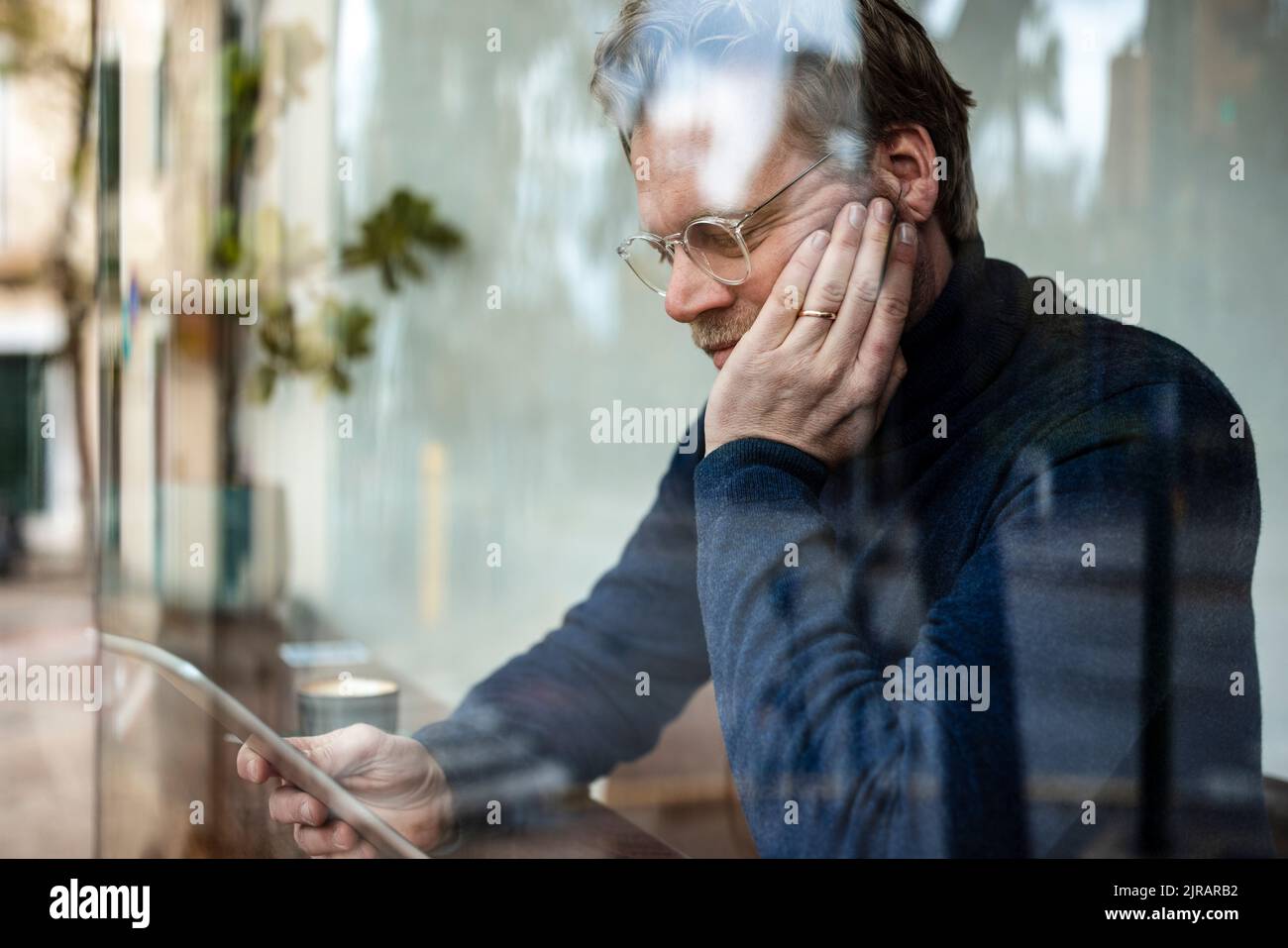 Watching through glass hi-res stock photography and images - Alamy
