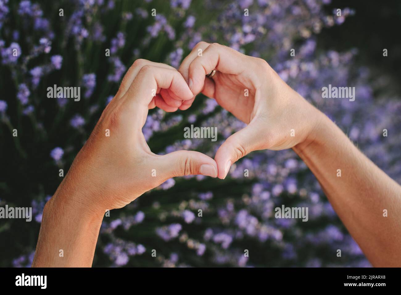 Woman hand over heart hi-res stock photography and images - Alamy