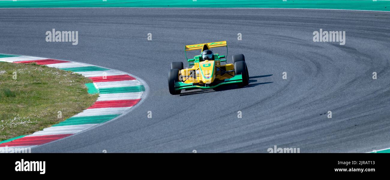 Formula race car single seater action on racetrack turn. Mugello, Italy ...