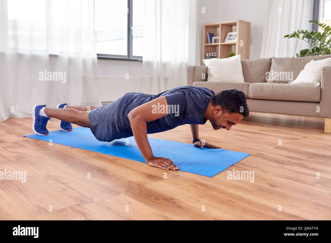 indian man doing push ups at home Stock Photo - Alamy