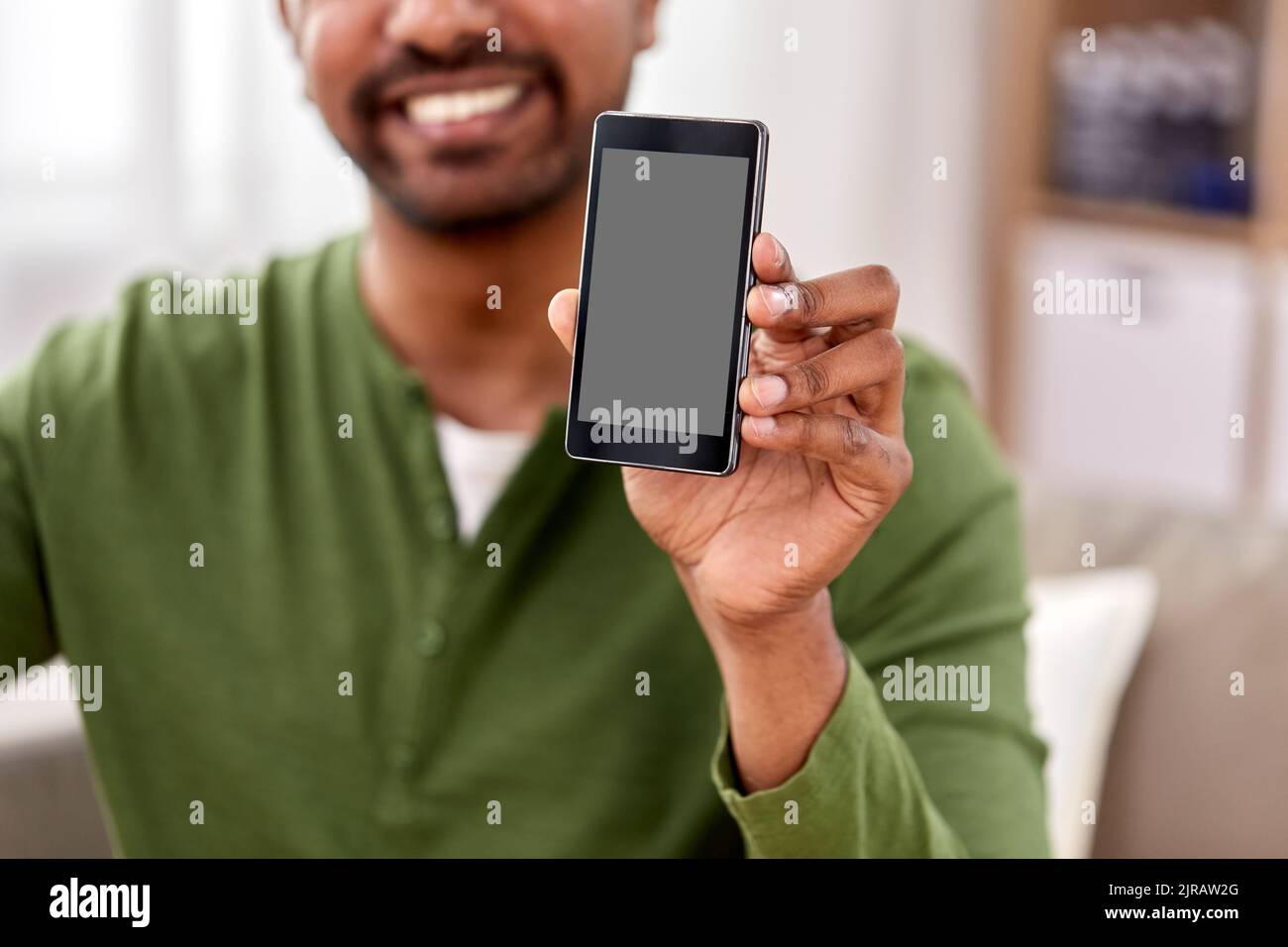 South indian man showing mobile hi-res stock photography and images - Alamy