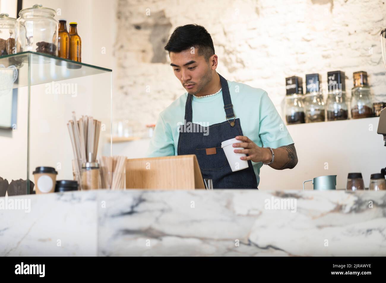 Man cup coffee working hi-res stock photography and images - Alamy