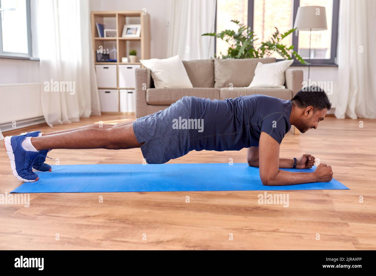 indian man doing plank exercise at home Stock Photo - Alamy