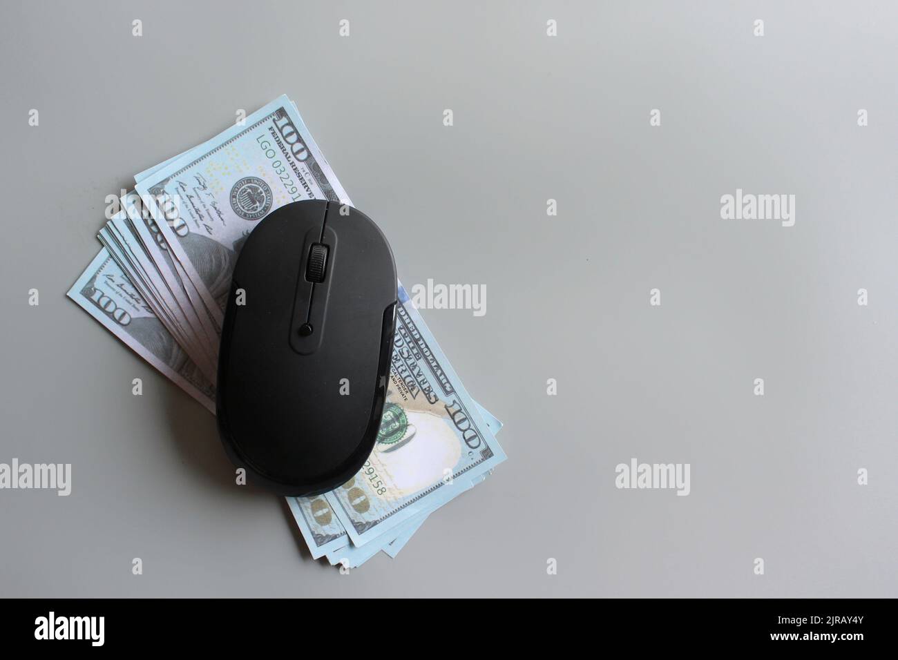 US dollar and computer mouse. Pay per click, online banking, shopping ...