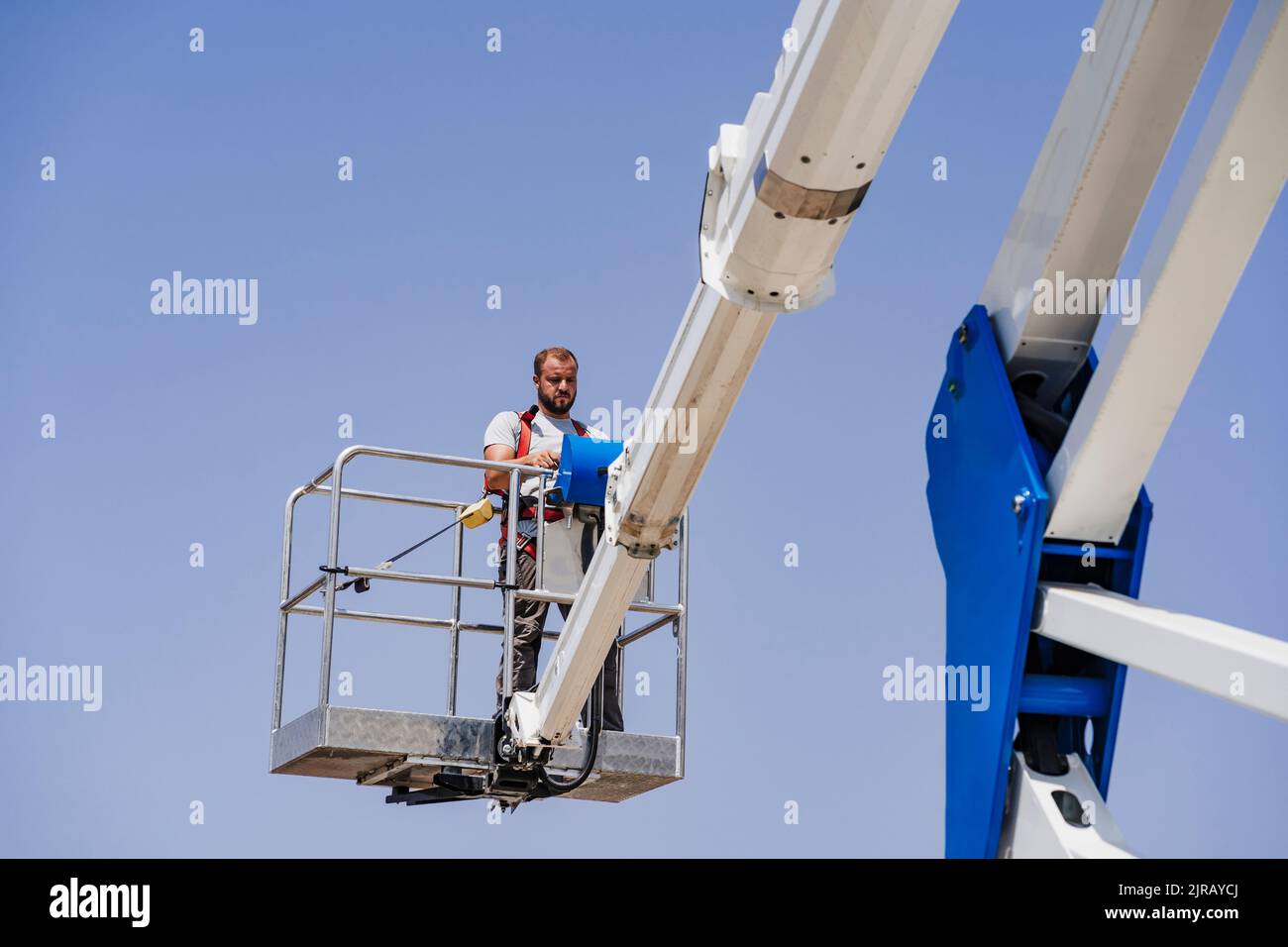 Electrician operating hydraulic platform hi-res stock photography and ...