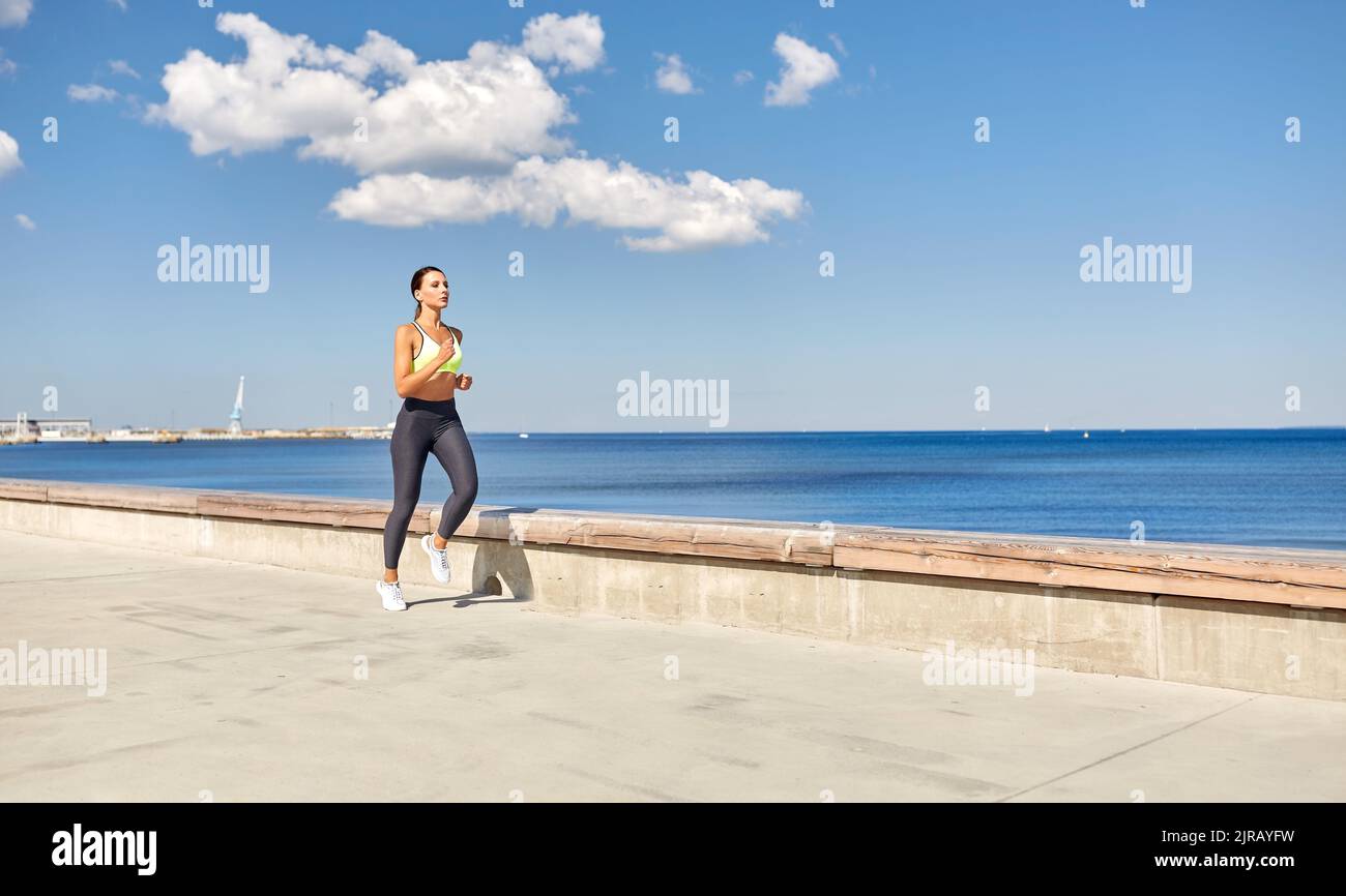 Person running out of sea hi-res stock photography and images - Alamy